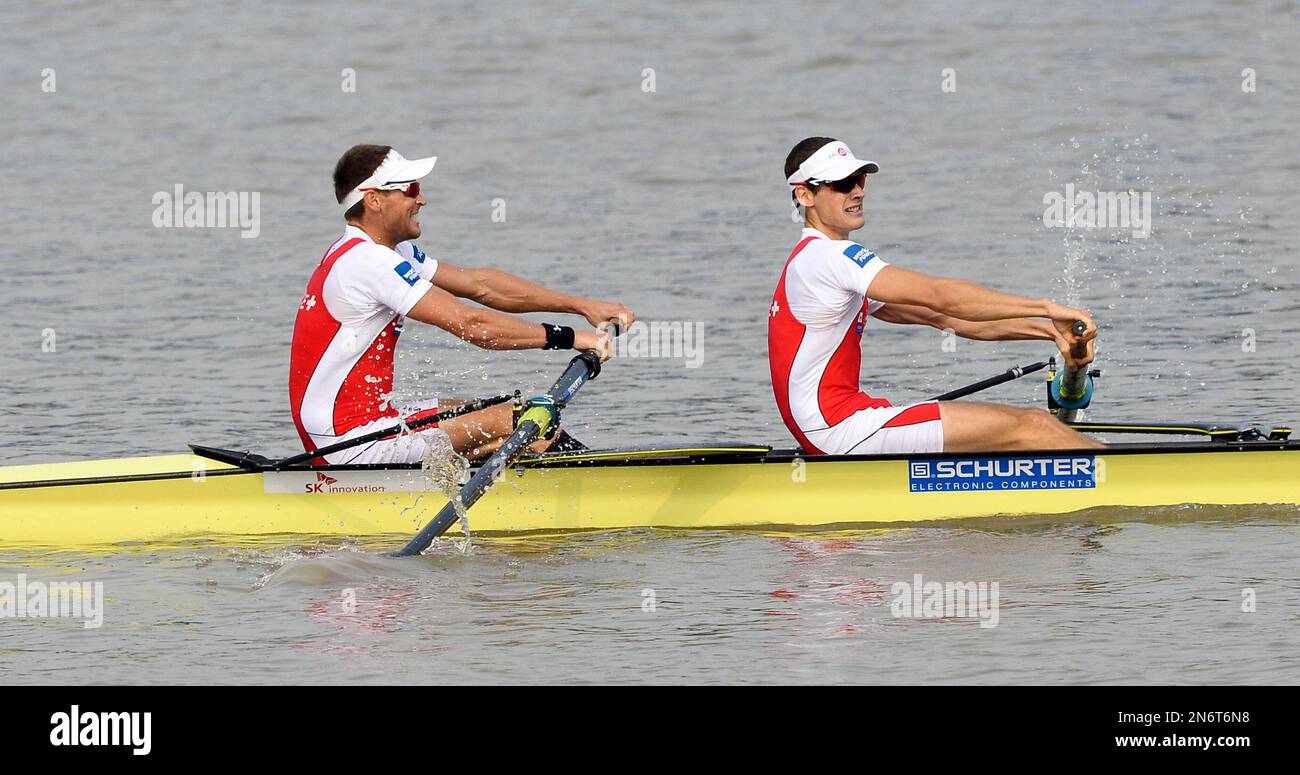 Simon Niepmann, left, and Lucas Tramer of Switzerland row, after ...