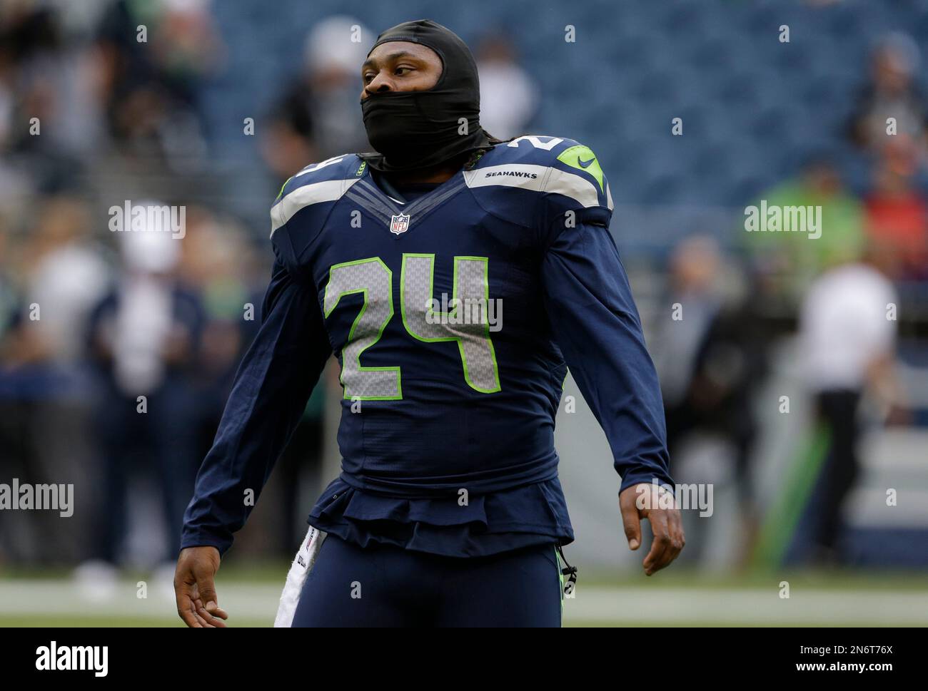 Seattle Seahawks' Marshawn Lynch wears a warming mask during warmups ...