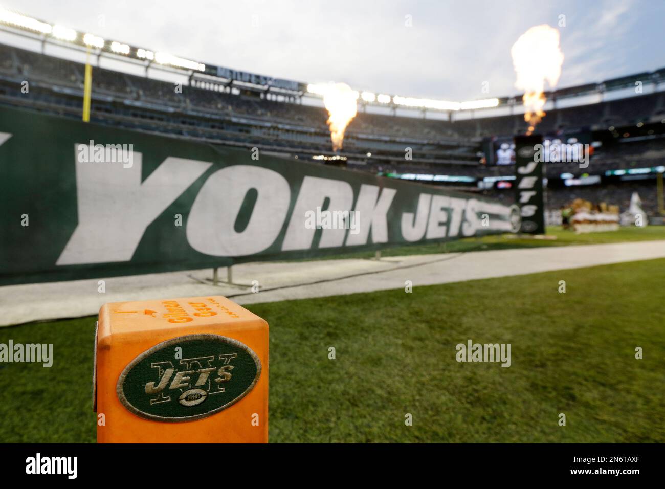The New York Jets logo is seen on a pylon as the team takes the field ...