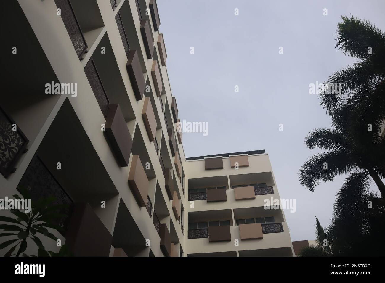 Perspective and lower angle view of the hotel building against the ...