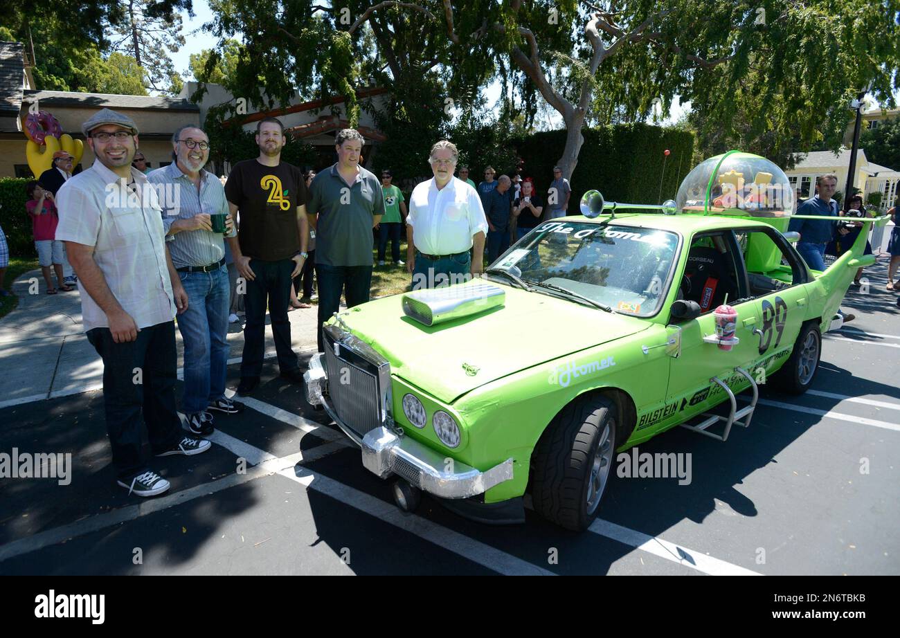 Designer Jeff Hermann (L-R), executive producer Jim Brooks, driver ...