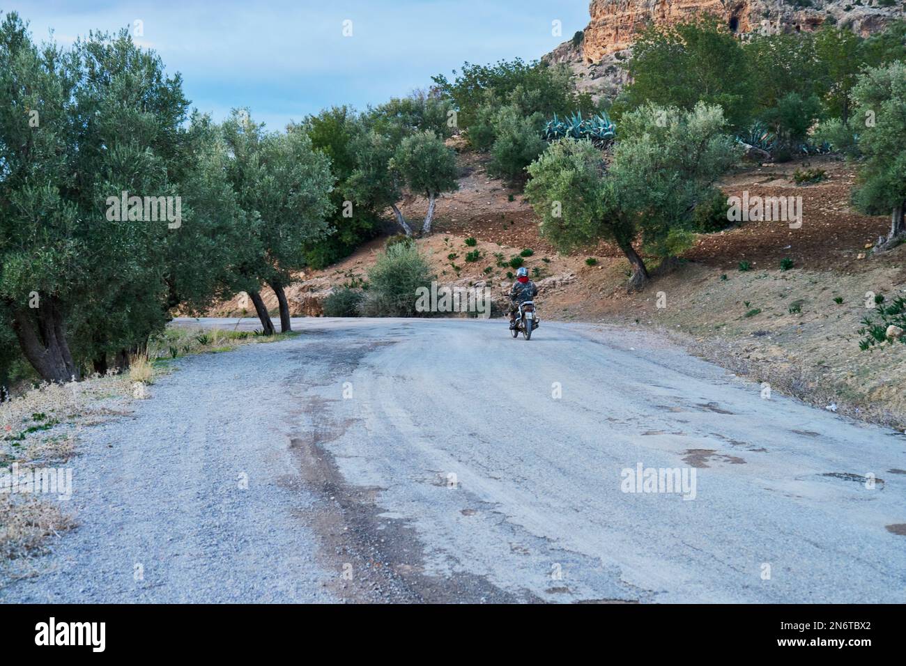 A motorcycle on a mountain road Stock Photo - Alamy