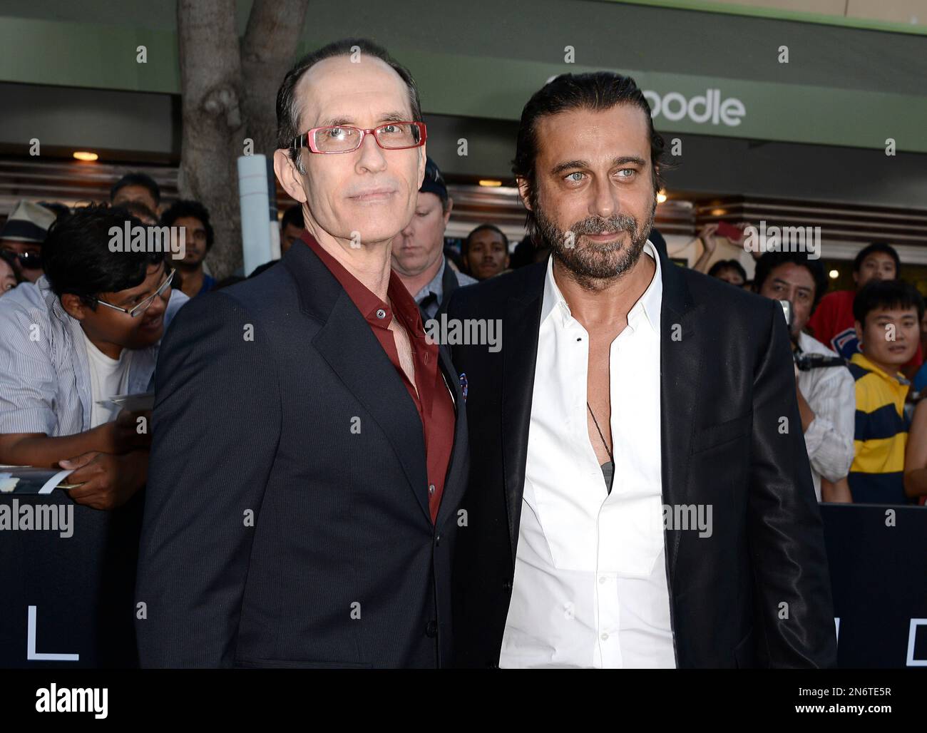 From left to right, director David Twohy and actor Jordi Molina arrive ...