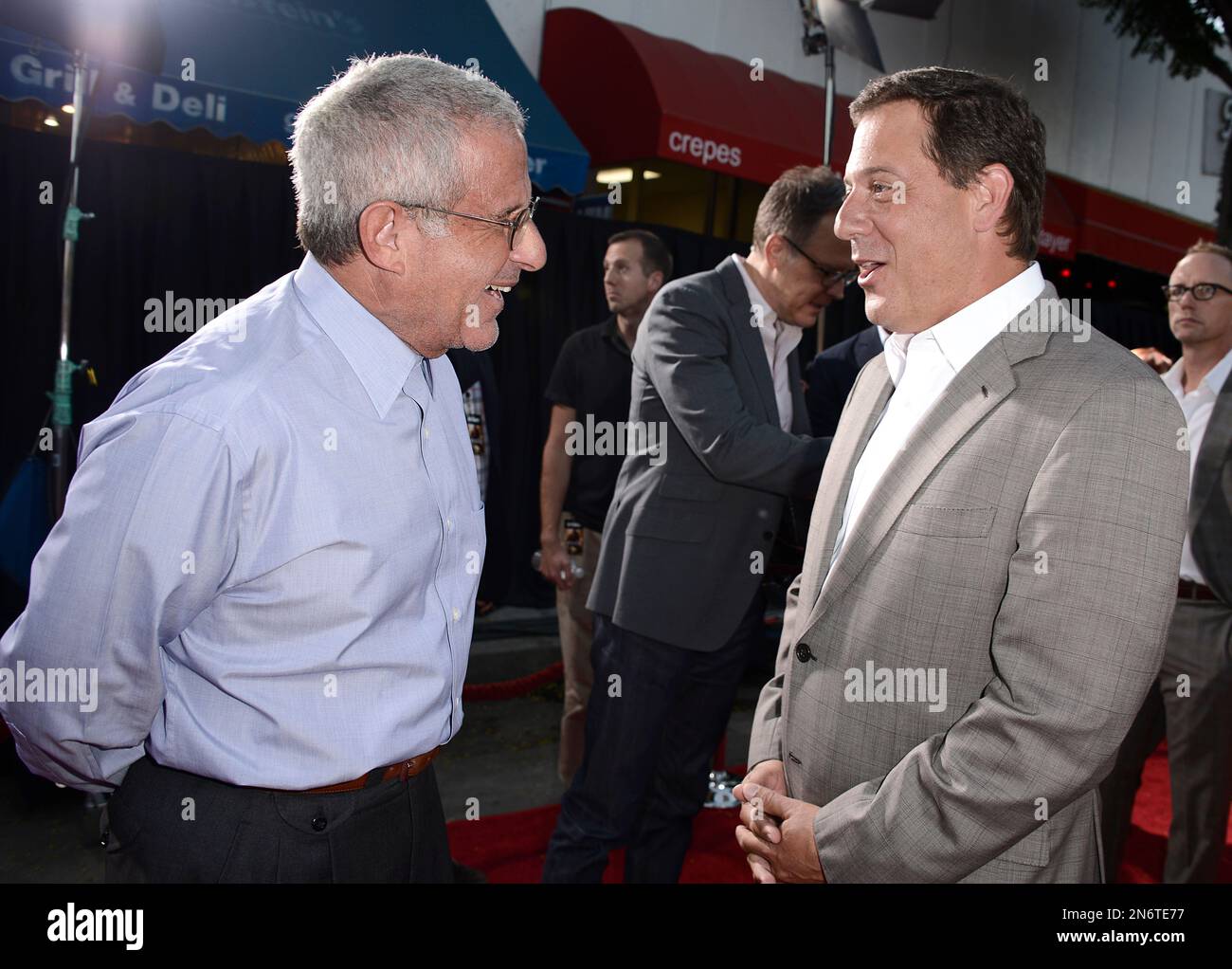 From left to right, executive Ron Meyer and executive Adam Fogelson ...