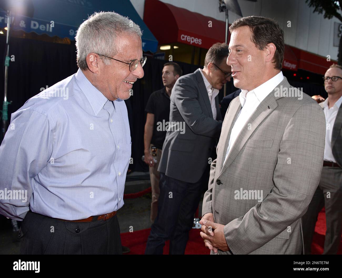 From left to right, executive Ron Meyer and executive Adam Fogelson ...