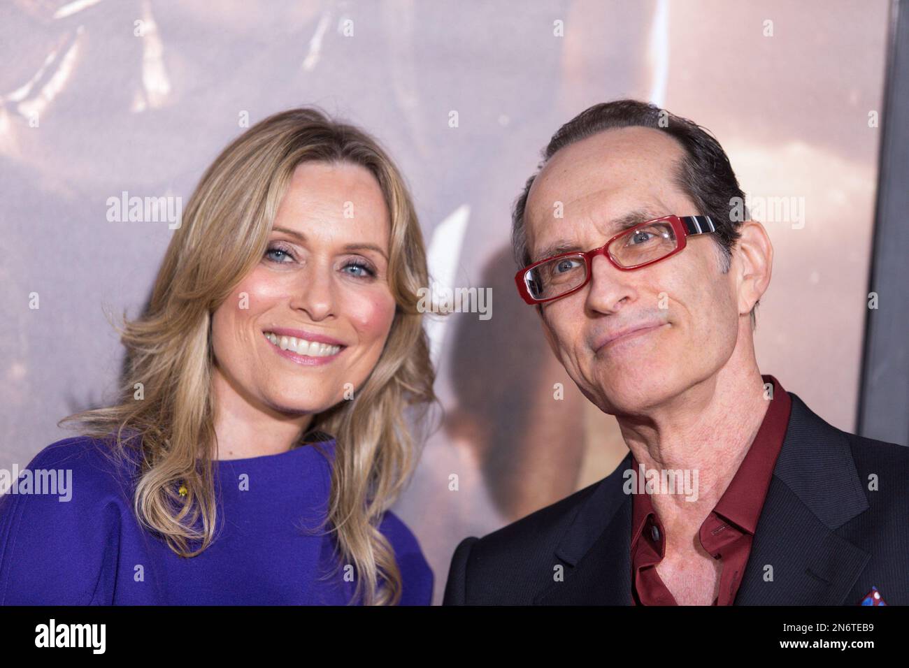 Writer/director David Twohy and guest arrive at the world premiere of ...