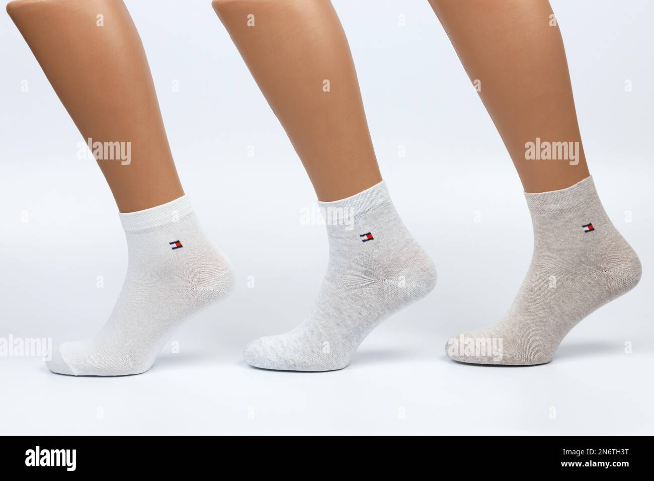 Socks on the leg. Socks on a white background Stock Photo - Alamy