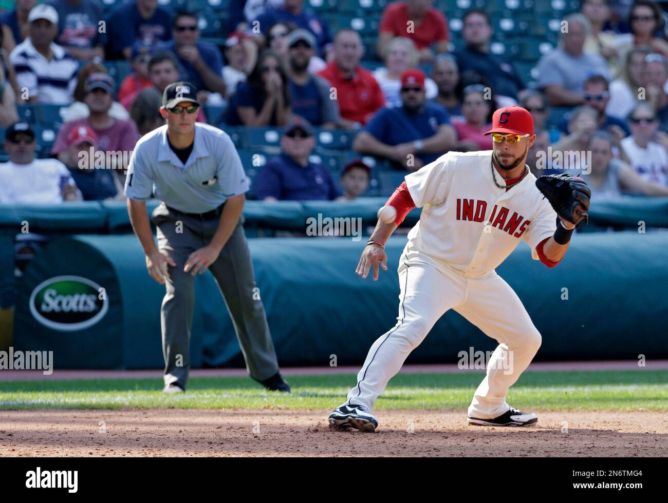 Cleveland Indians third baseman Mike Aviles fields a ground ball in a ...