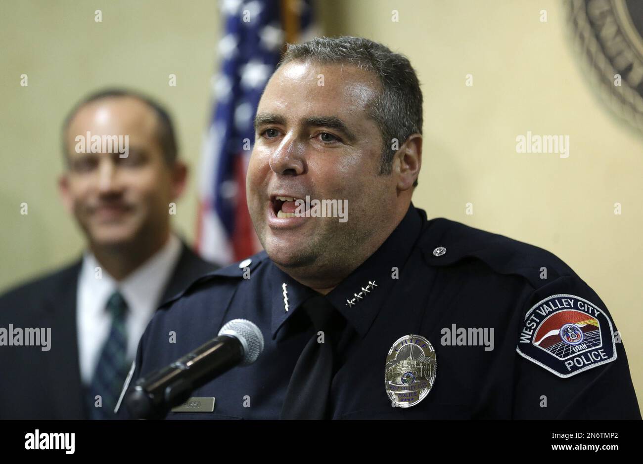 West Valley City, City Manager Wayne Pyle, left, looks on as Lee Russo ...