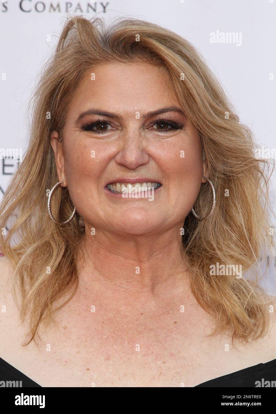 Producer Robin Broidy arrives at the premiere of "Snake and Mongoose ...