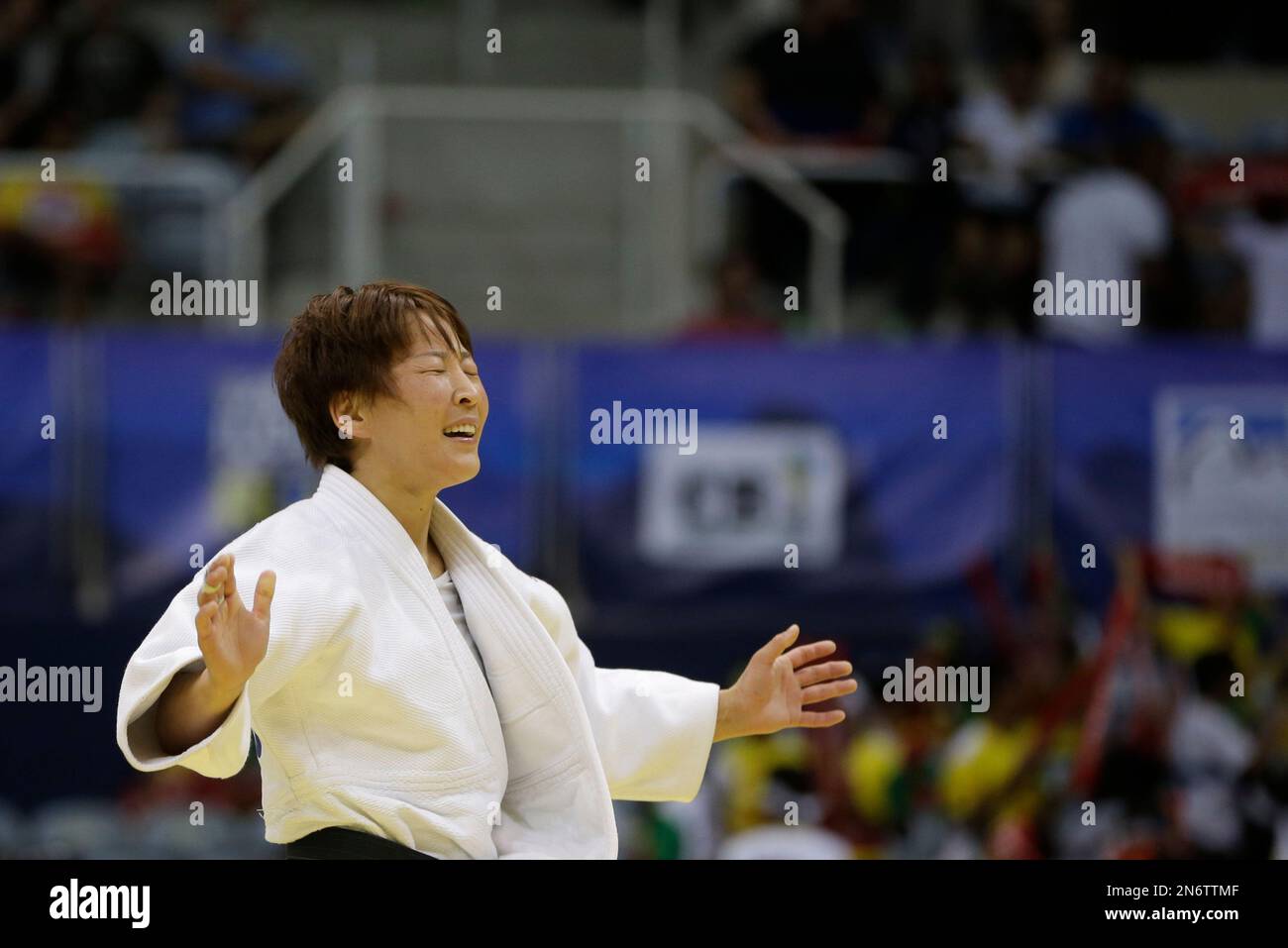Urantsetseg Munkhbat, from Mongolia, celebrates after defeating Haruna ...