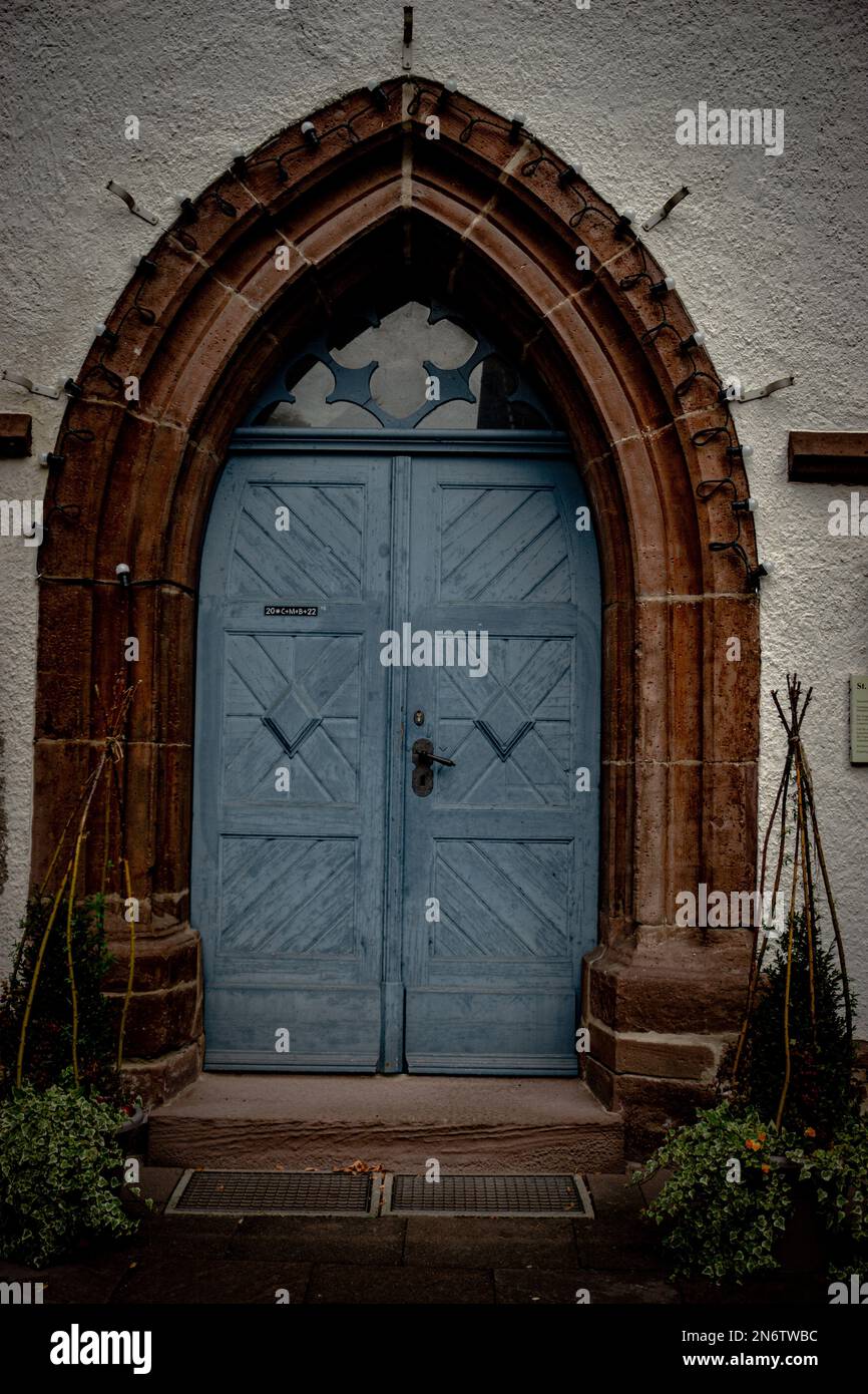Closeup shot of an antique and rustic church door of a Christian church ...