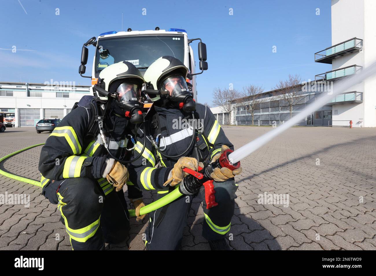 Gera, Germany. 09th Feb, 2023. Two trainees of the professional fire ...