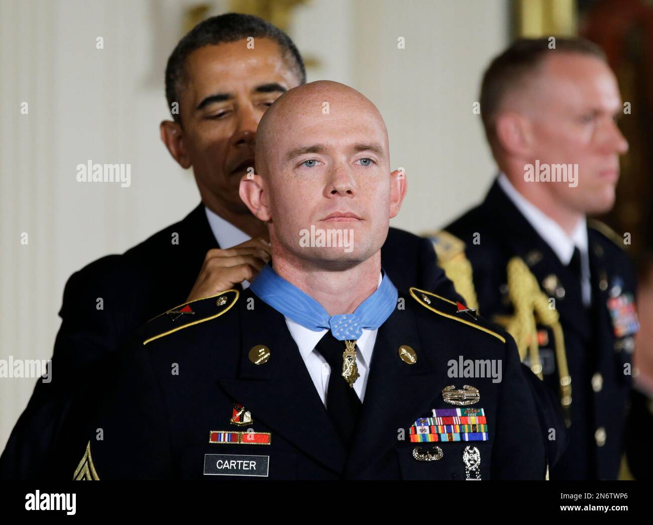 President Barack Obama awards US Army Staff Sgt. Ty M. Carter the Medal ...