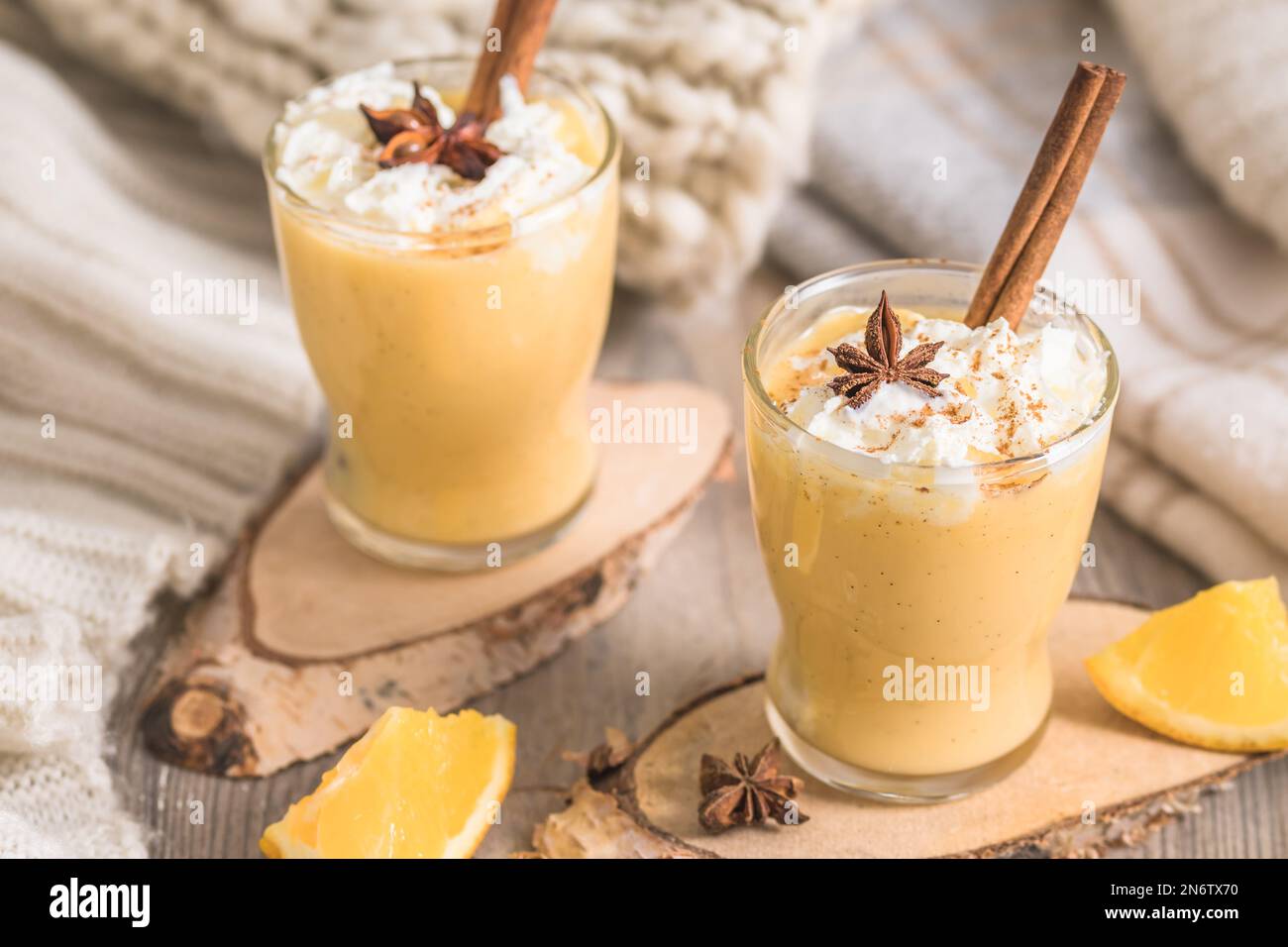 Two glasses of eggnogg with whipped cream and cinnamon. Auld Man's milk ...
