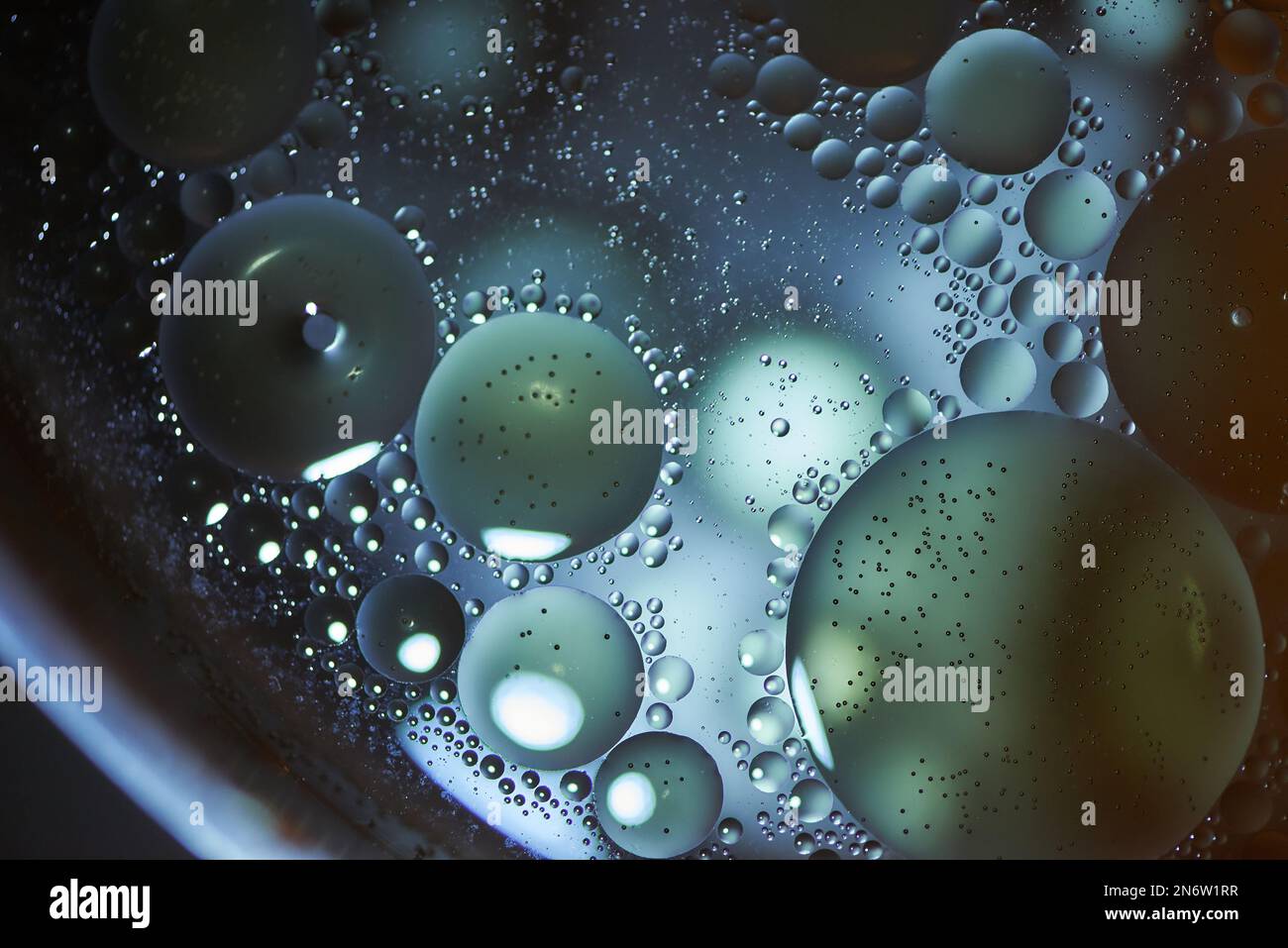 Looking through a microscope abstract hi-res stock photography and ...