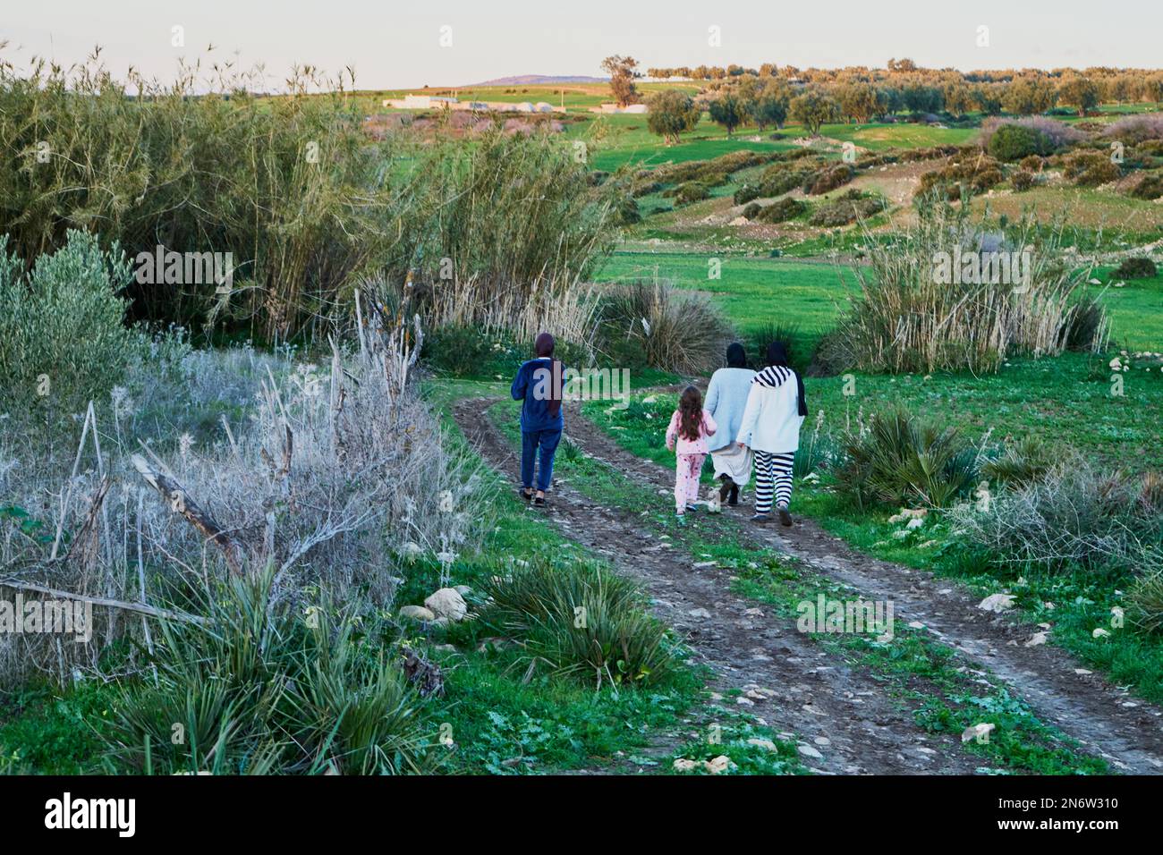 People walking in a rural place Stock Photo - Alamy