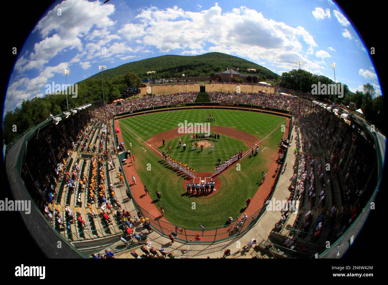 Tokyo, Japan lines up on the first base line and Chula Vista, Calif ...