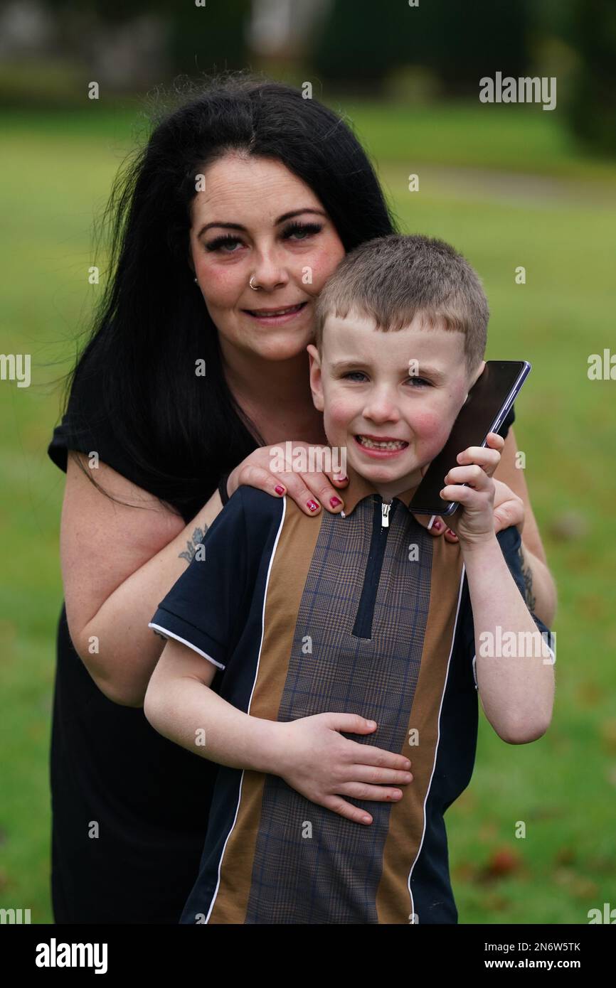 Four-year-old Hanlon Stevenson with his mother Lisa after he received a ...