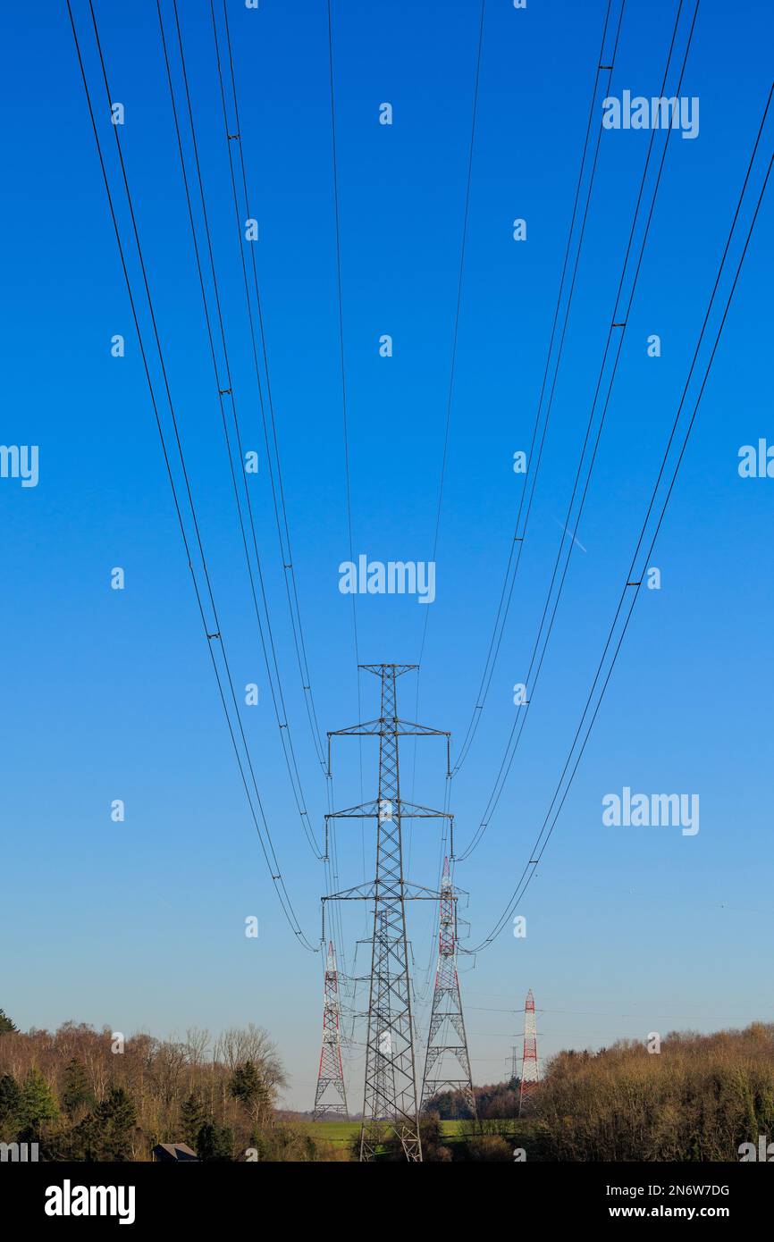 High voltage power lines in the countryside Stock Photo - Alamy