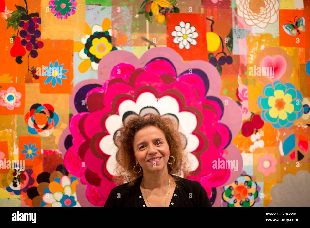Brazilian artist Beatriz Milhazes poses for a portrait in front of one ...