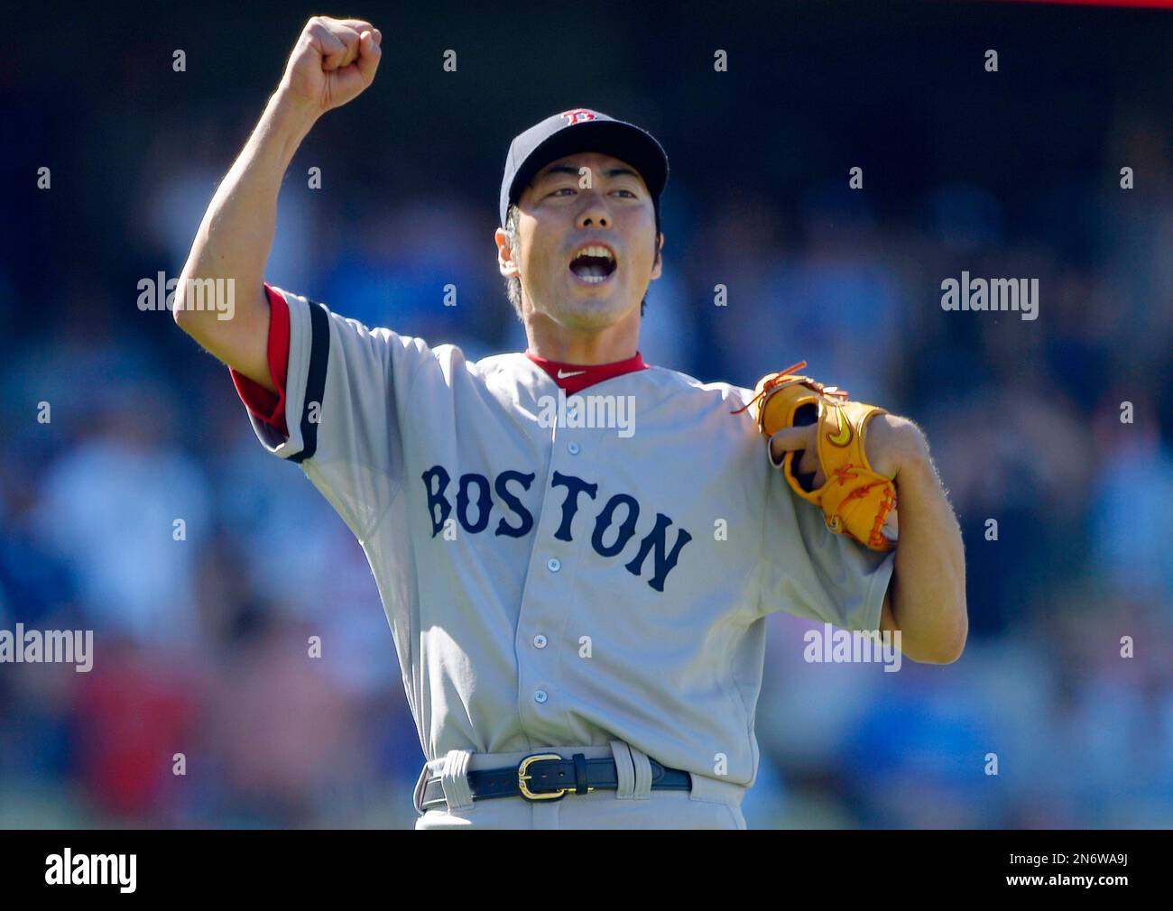 Boston Red Sox relief pitcher Koji Uehara, of Japan, celebrates as they ...
