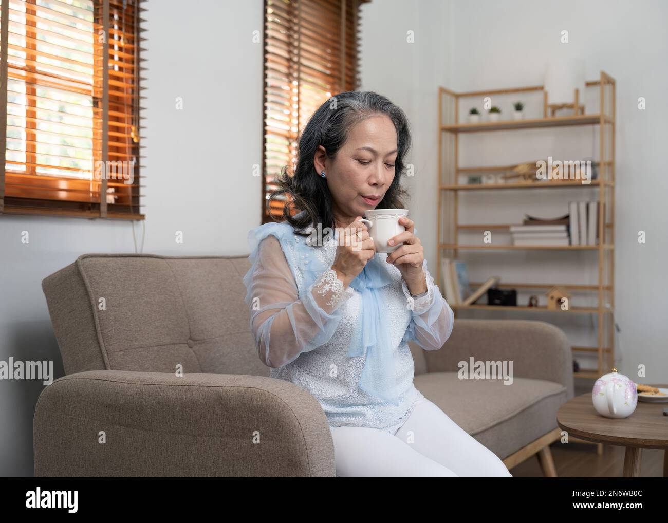 Couple sipping tea hi-res stock photography and images - Alamy