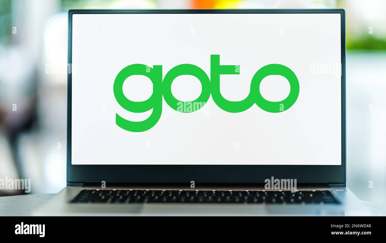 POZNAN, POL - JUN 28, 2022: Laptop computer displaying logo of PT GoTo ...