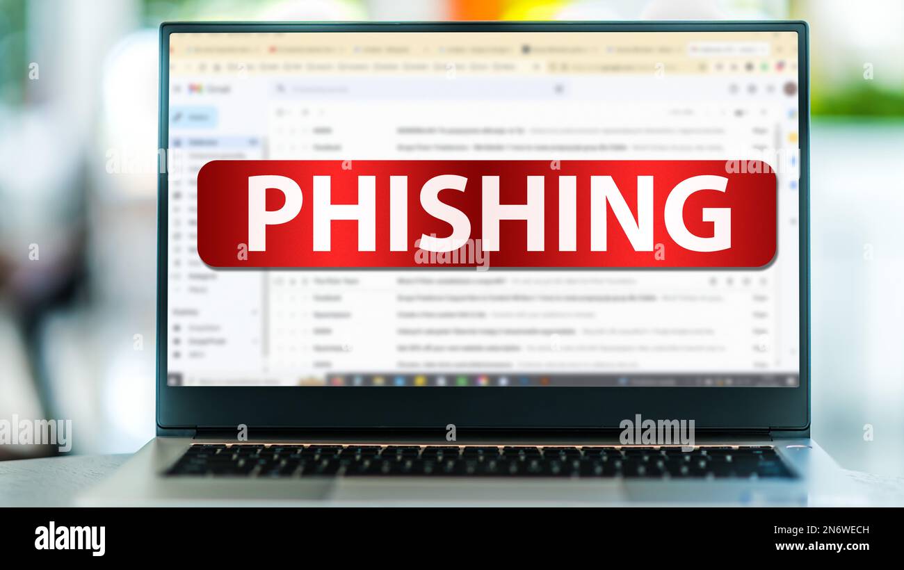 Laptop computer displaying the sign of phishing on an internet email ...