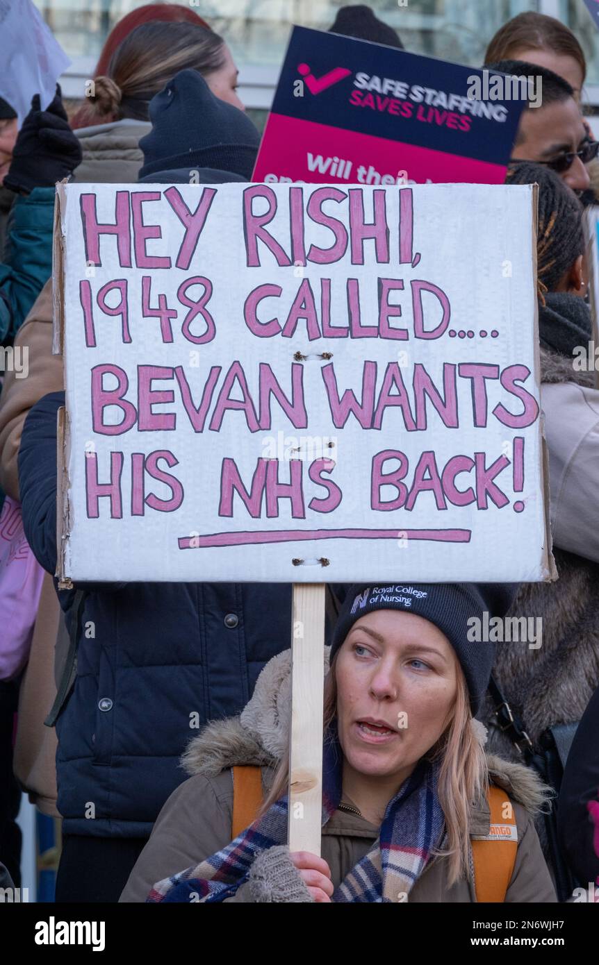 Striking nurses with placards, demonstrating outside University College ...