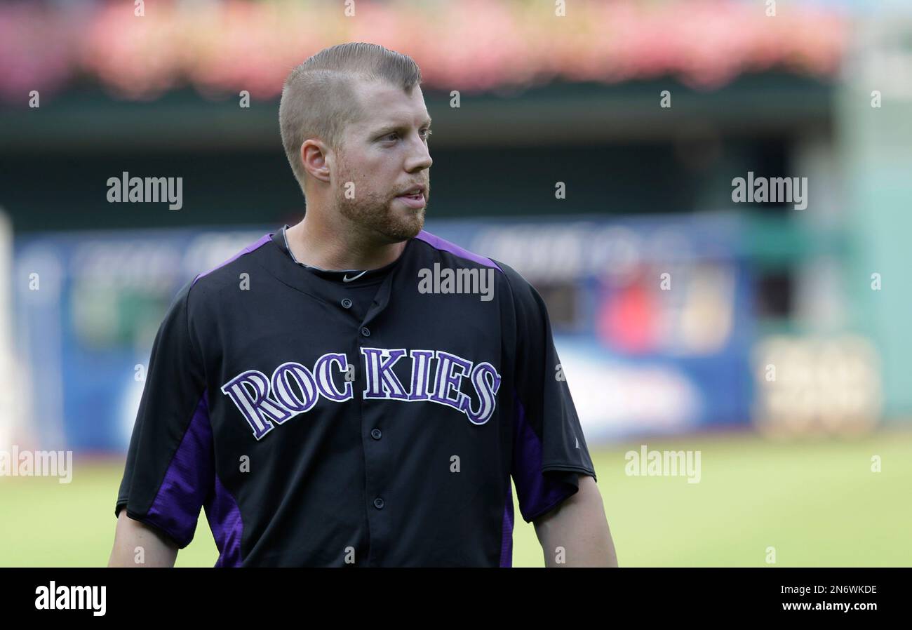 Colorado Rockies pitcher Josh Outman in warm ups before a baseball game ...
