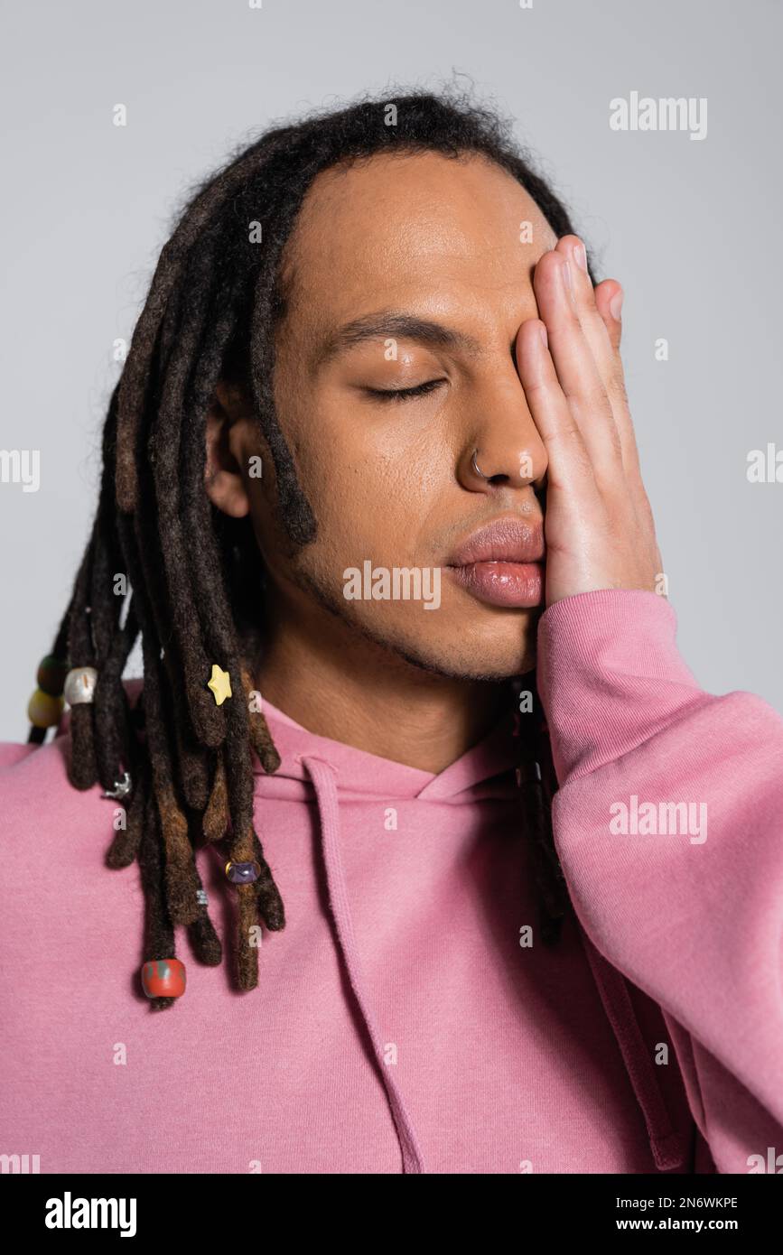 Dreadlocks covering face hi-res stock photography and images - Alamy