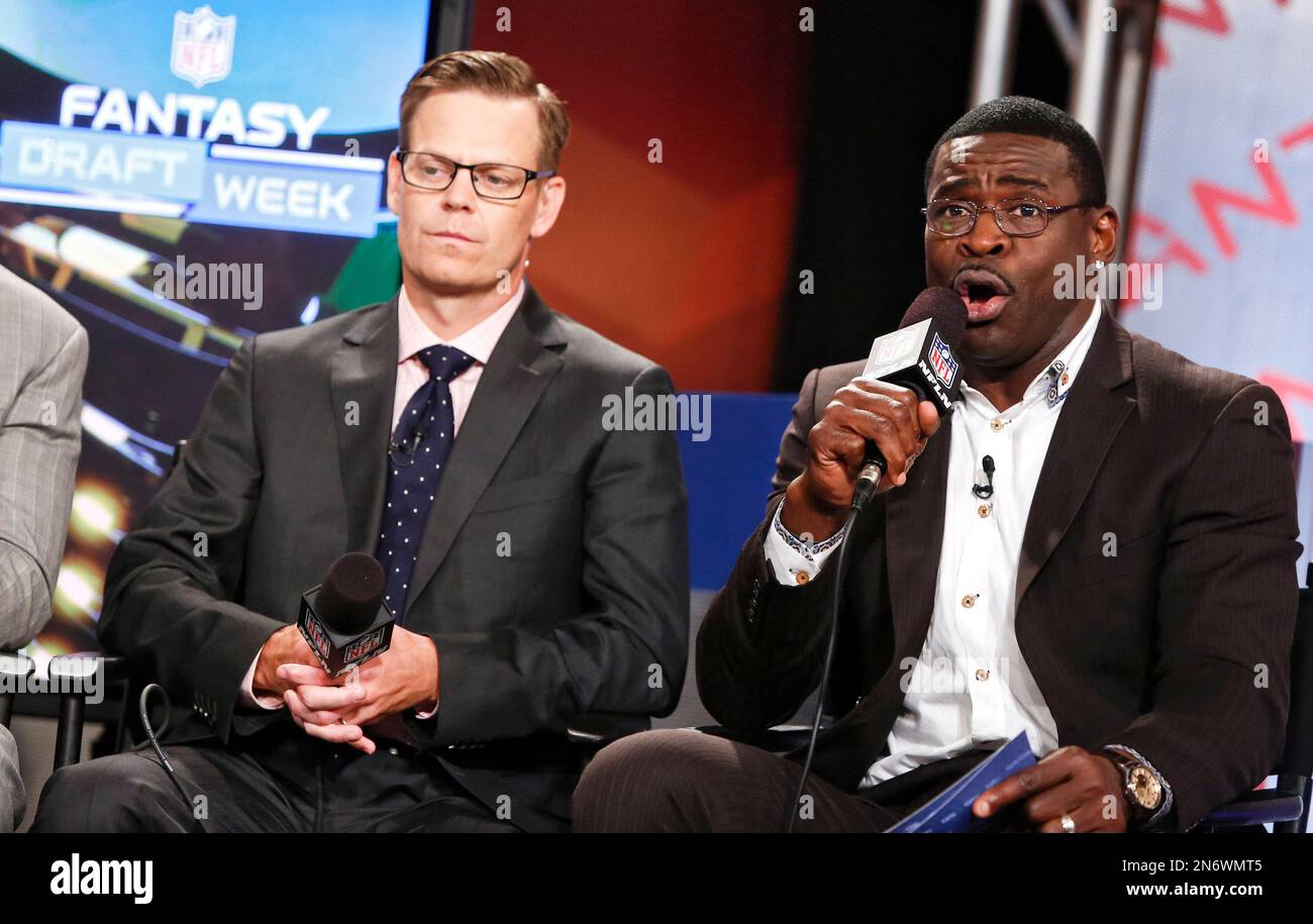 Commentator Matt Smith and former NFL player Michael Irvin are seen at ...