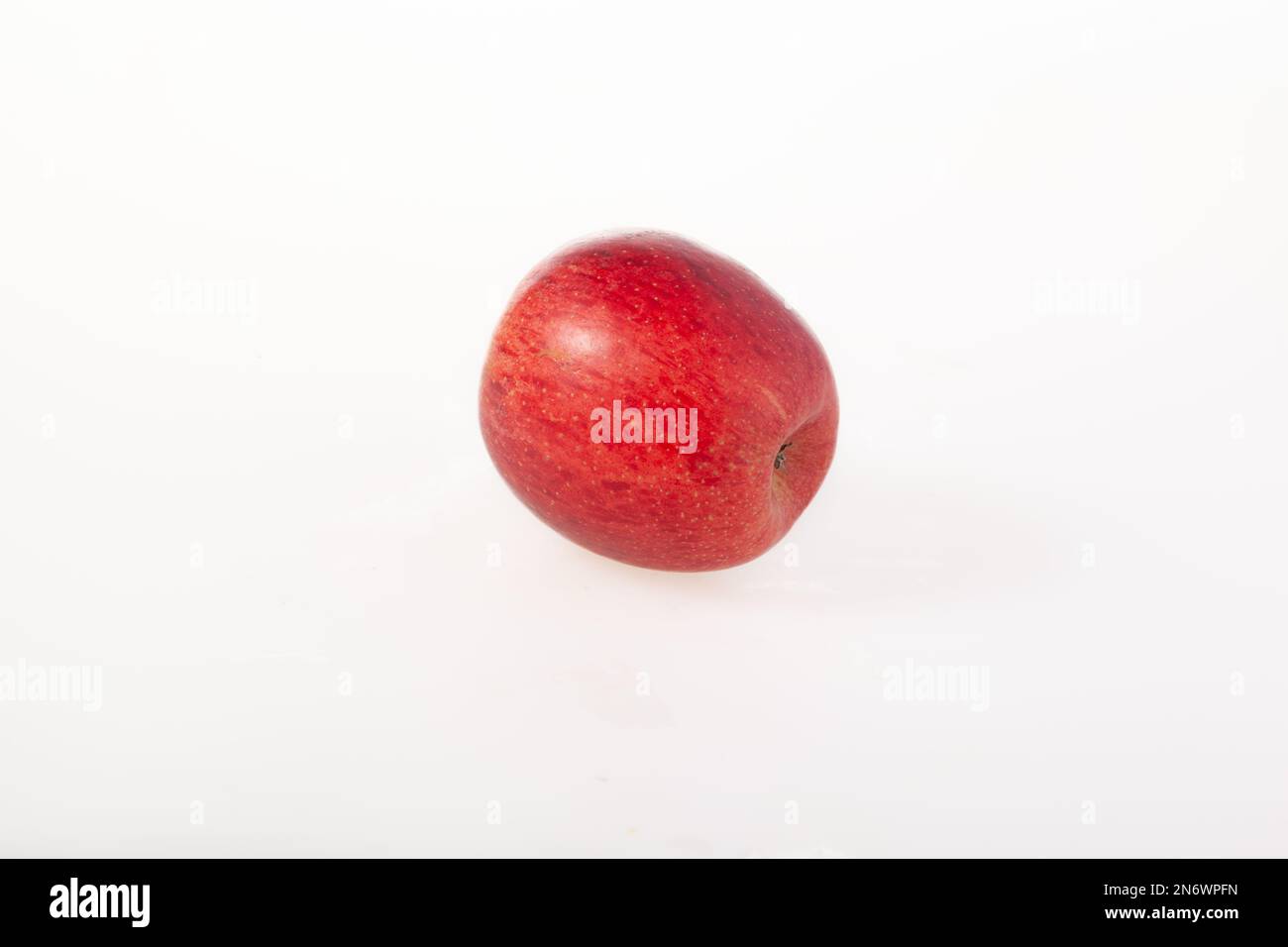 Whole red apple isolated on white background Stock Photo - Alamy