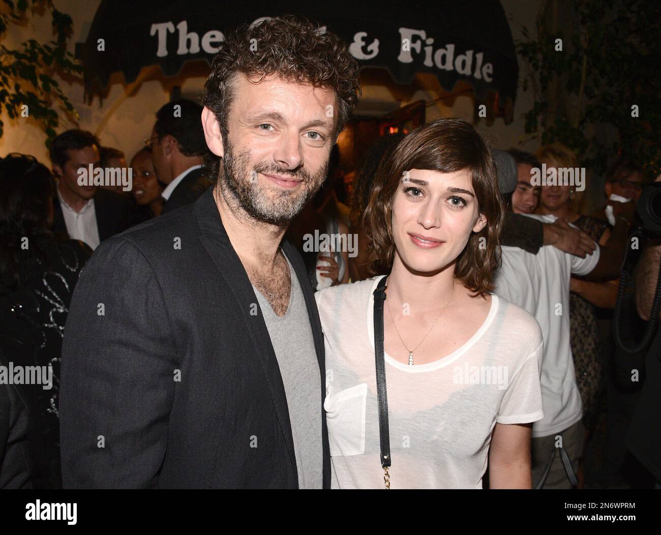 From left to right, actor Michael Sheen and actress Lizzy Caplan attend ...