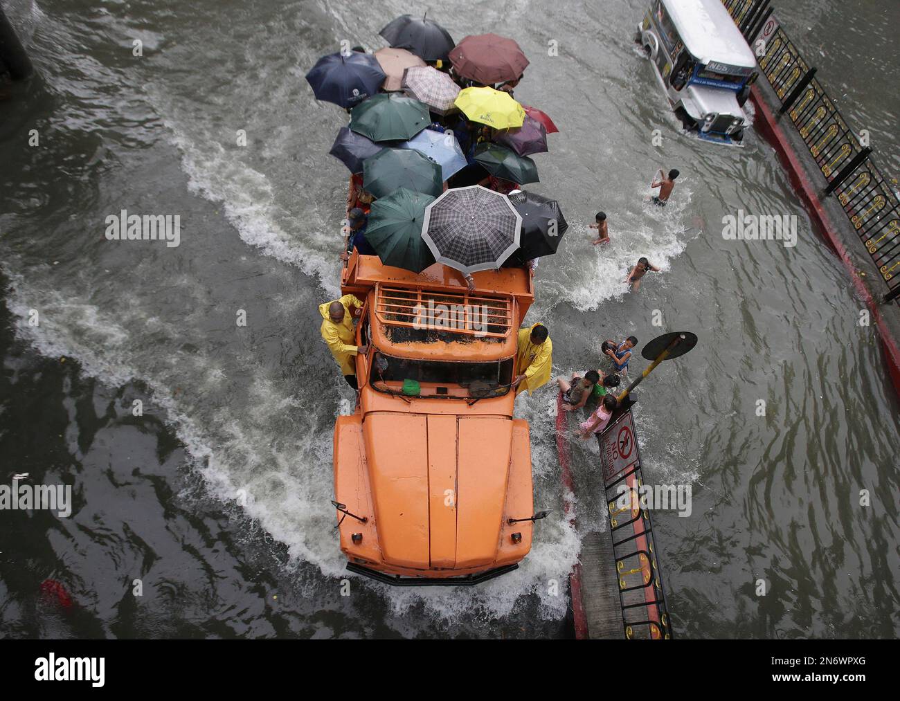 FILE - In this Aug. 19, 2013 file photo, a truckload of stranded ...