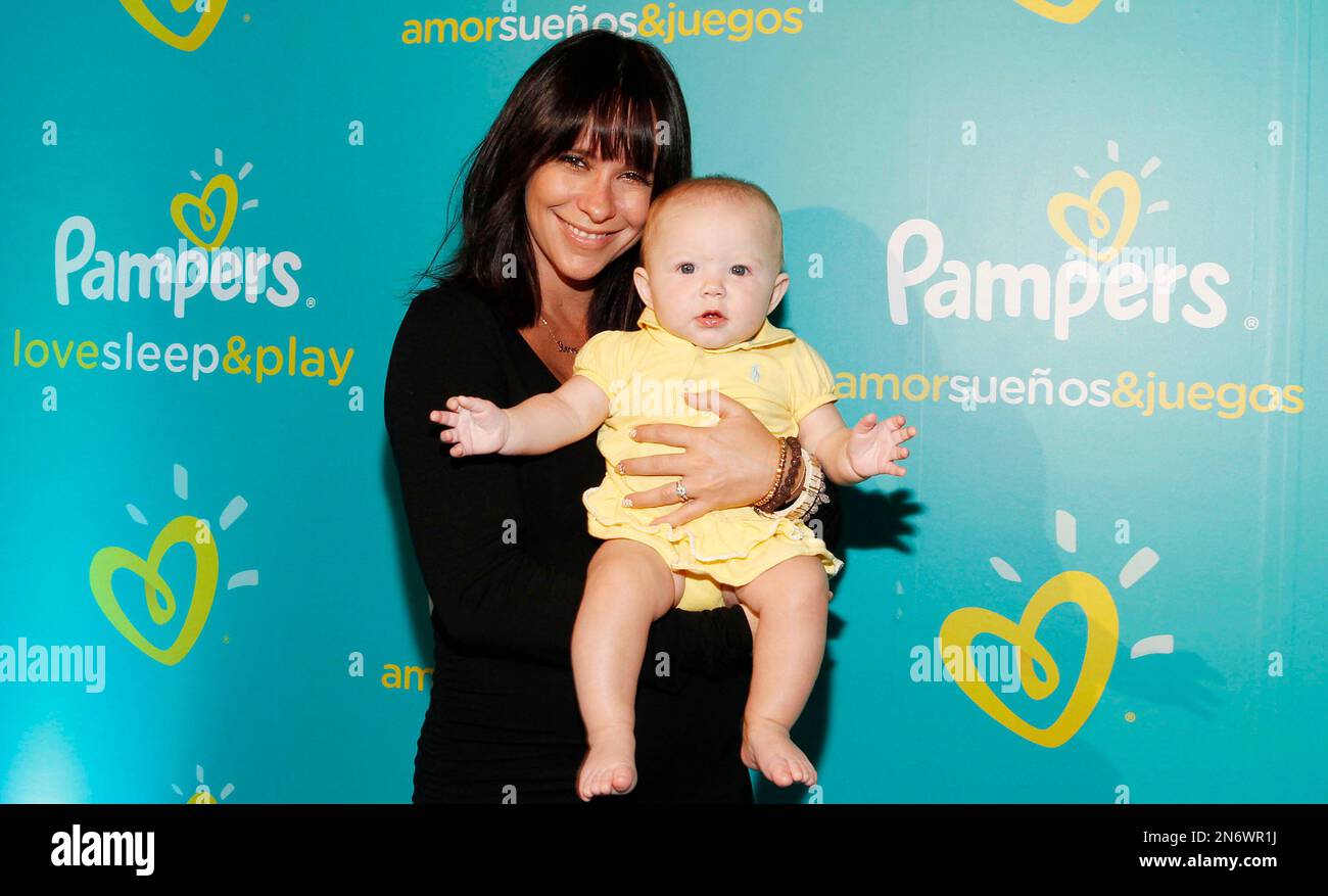 IMAGE DISTRIBUTED FOR PAMPERS - Jennifer Love Hewitt poses with ...