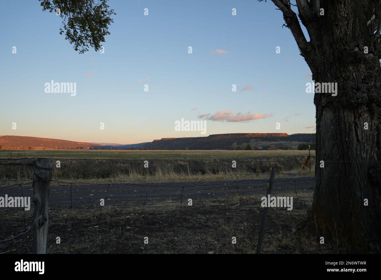 The golden hour over Central Oregon ranch Stock Photo - Alamy