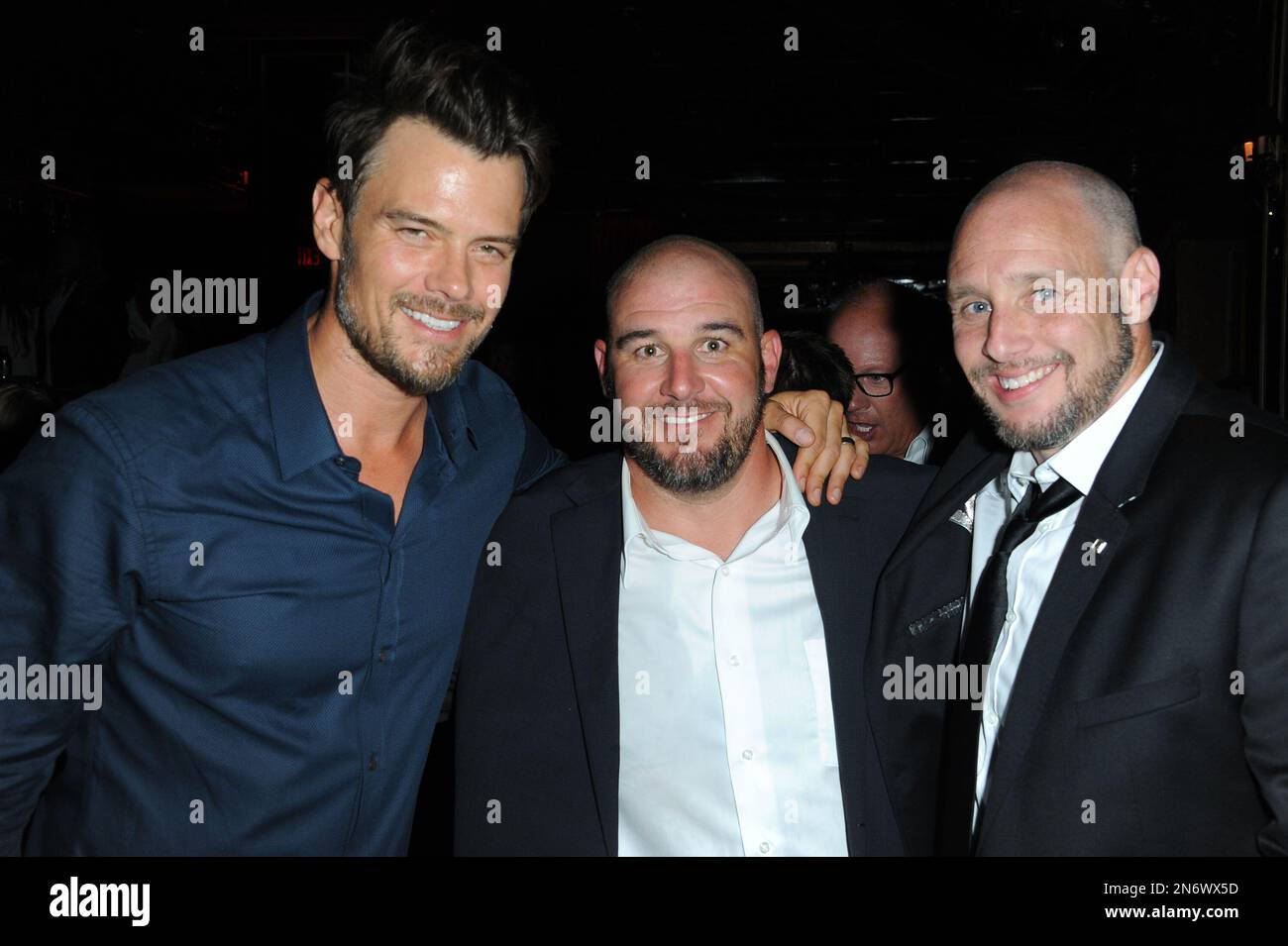 Josh Duhamel, from left, Michael Goetz, and Kevin Goetz attend the ...
