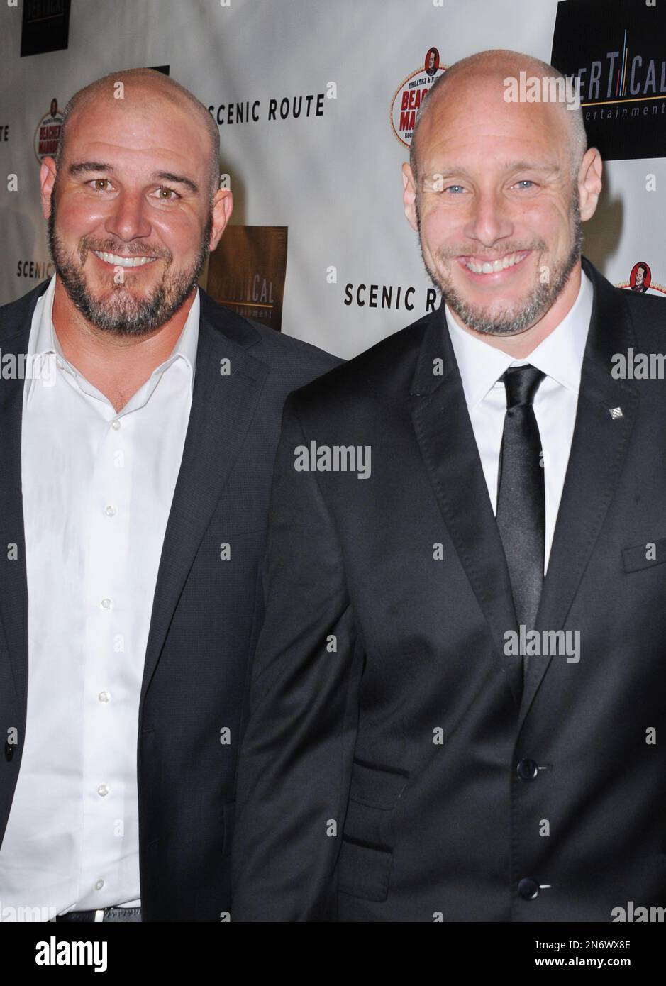 Michael Goetz, at left, and Kevin Goetz arrive on the red carpet for ...