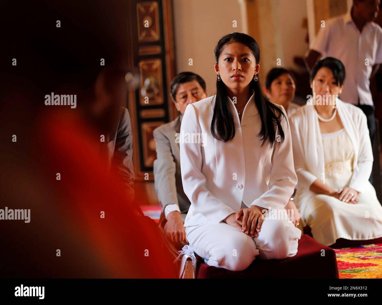 Japanese Princess Tsuguko, center front, listens to Sri Lankan Buddhist ...