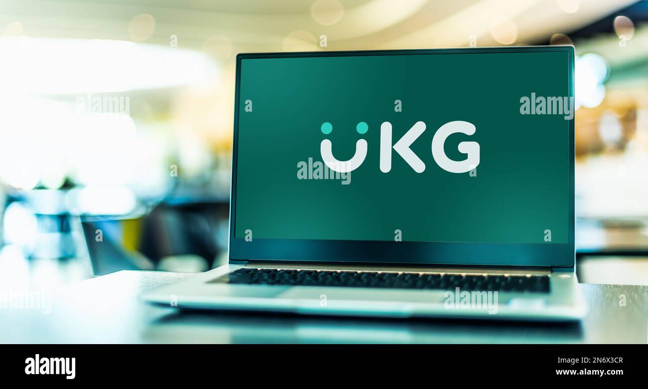 POZNAN, POL - DEC 28, 2022: Laptop computer displaying logo of UKG, a ...