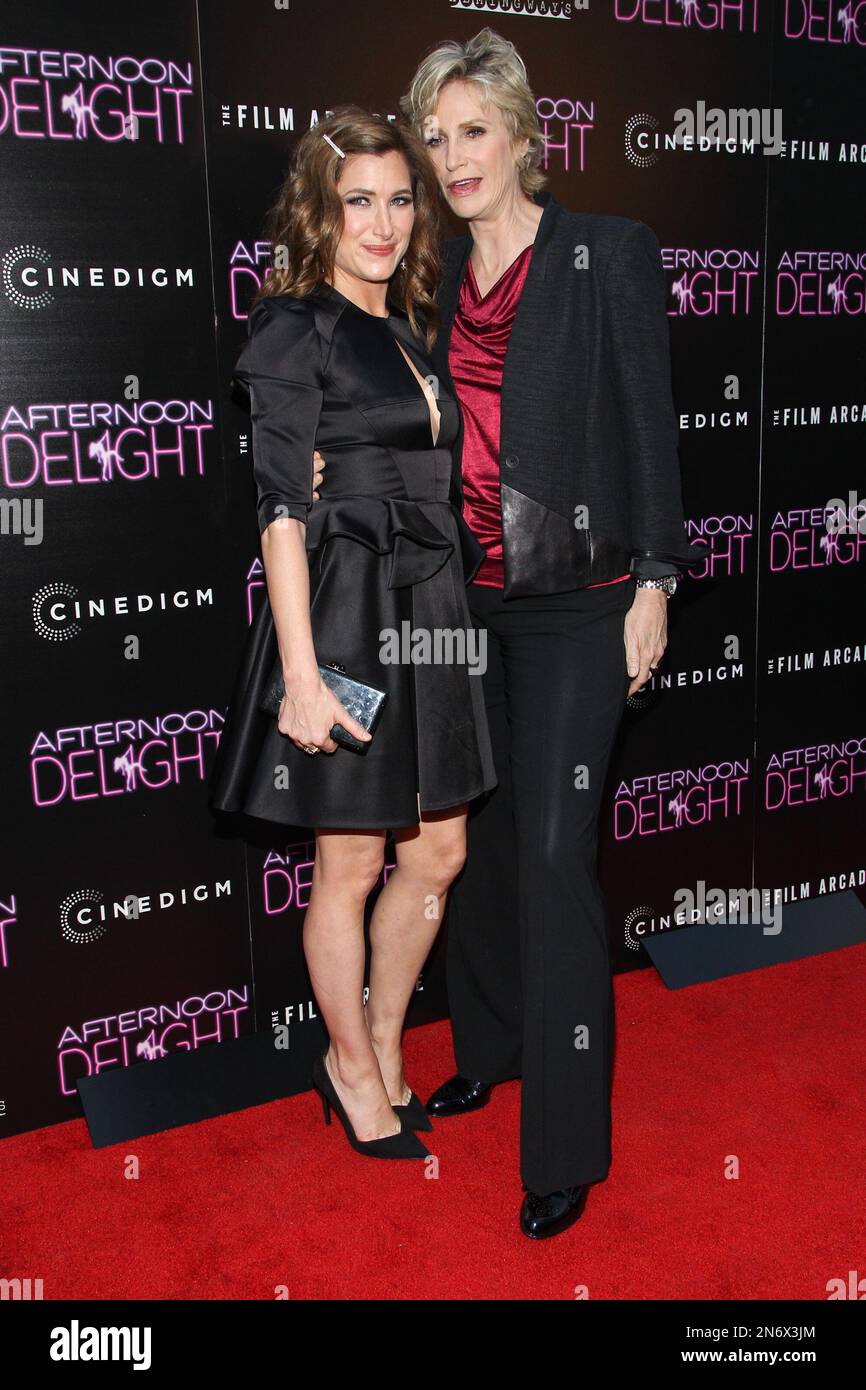 From left, actresses Kathryn Hahn and Jane Lynch arrive at the premiere ...