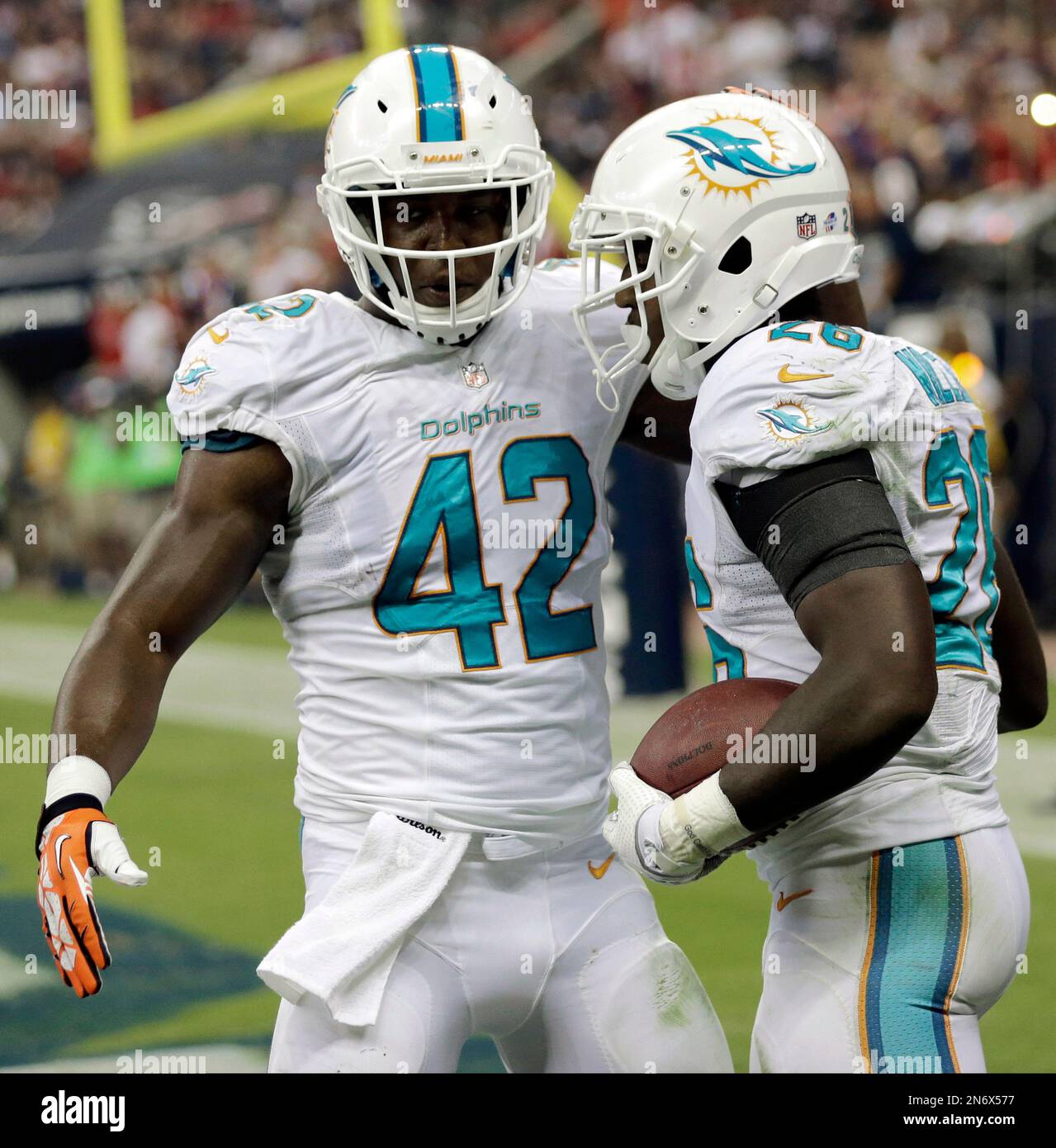 Miami Dolphins running back Lamar Miller (26) celebrates his touchdown ...