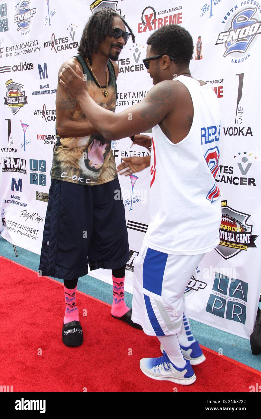 From left, recording artists Snoop Dogg, and Ray-J attend the 1st ...