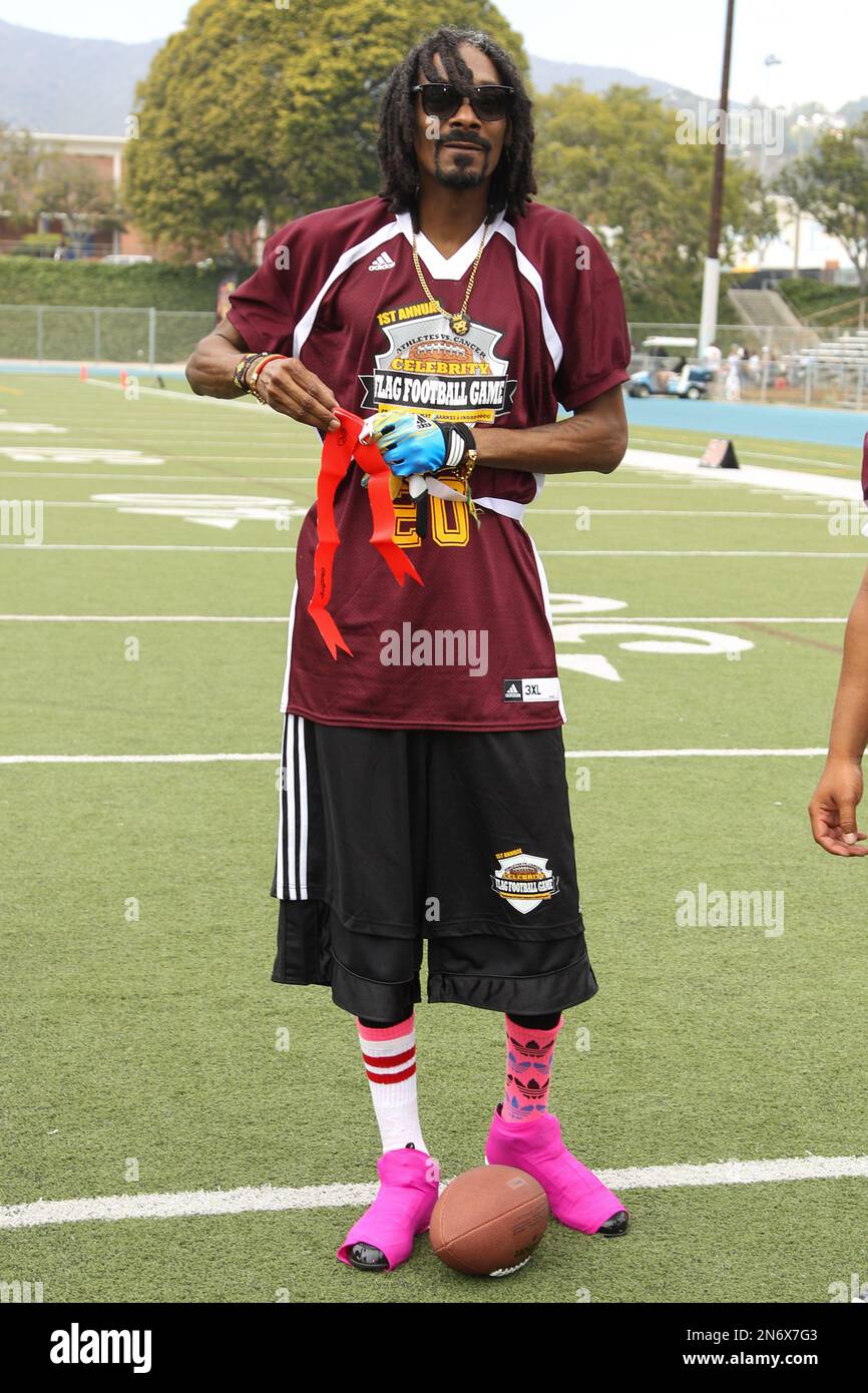 Recording artist Snoop Dogg attends the 1st Annual Athletes vs. Cancer ...