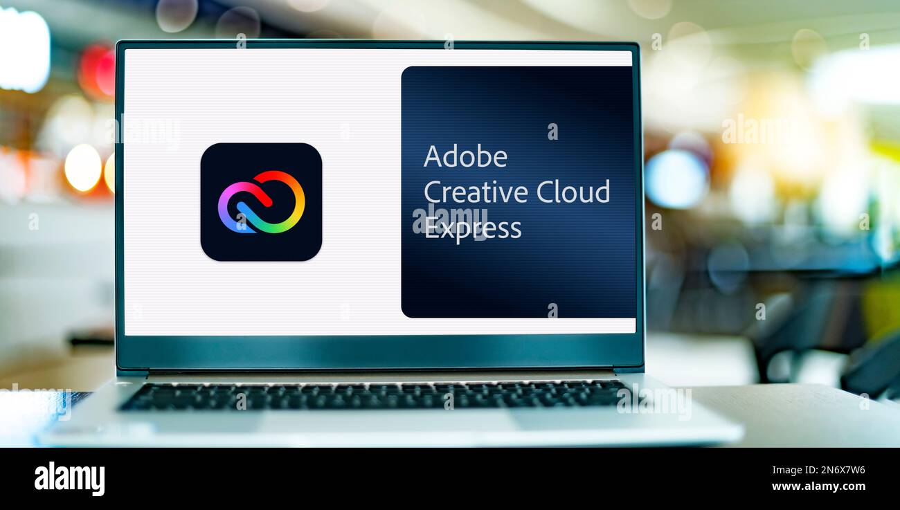POZNAN, POL - JUN 21, 2022: Laptop computer displaying logo of Adobe Creative Cloud Express, a ...