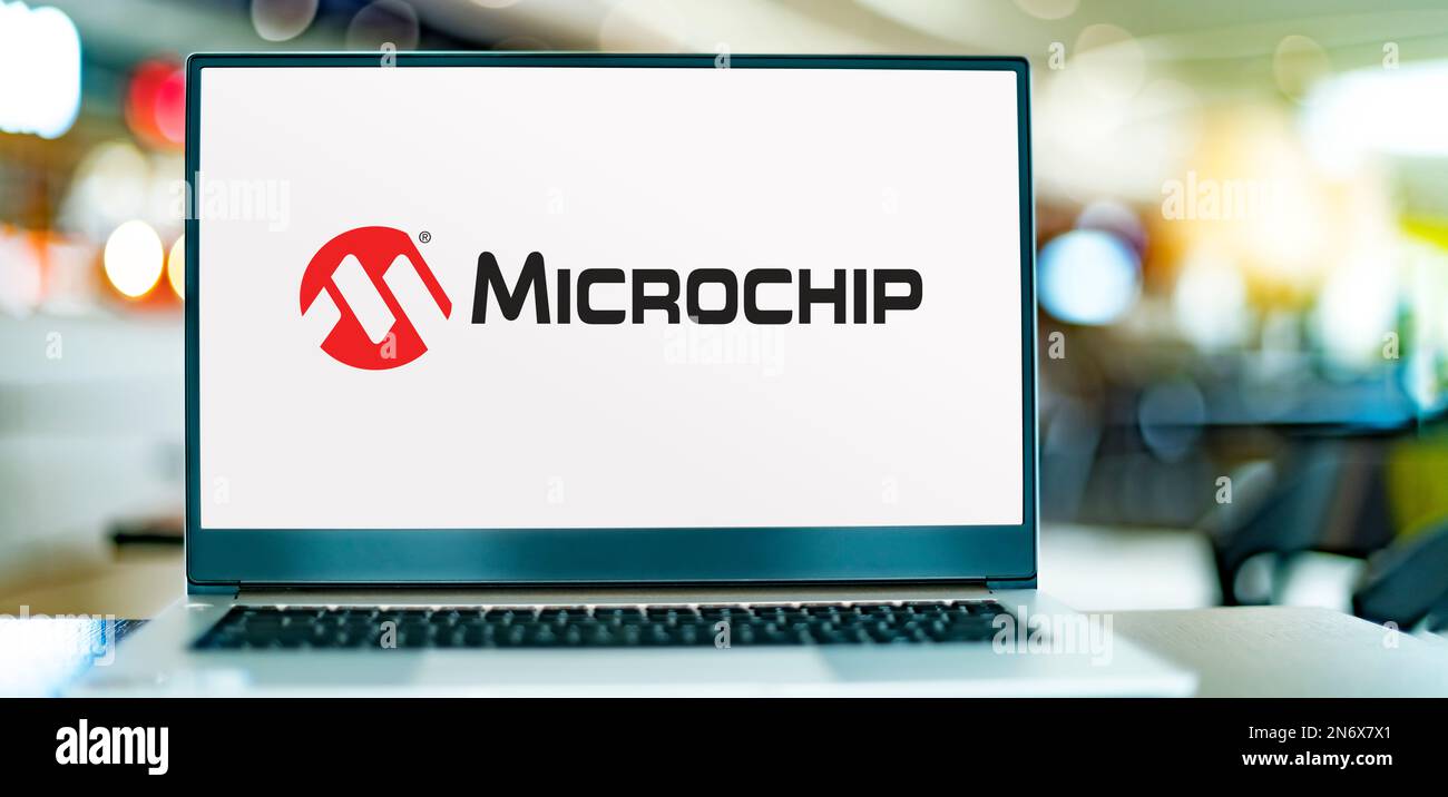 POZNAN, POL - AUG 2, 2022: Laptop computer displaying logo of Microchip ...
