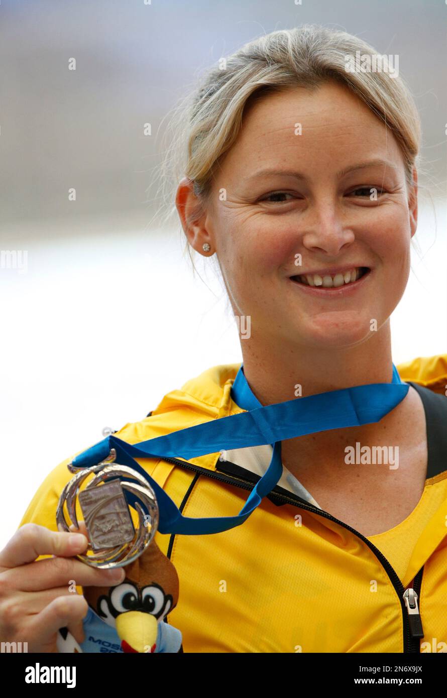Australia's Kimberley Mickle shows off her silver medal during the ...