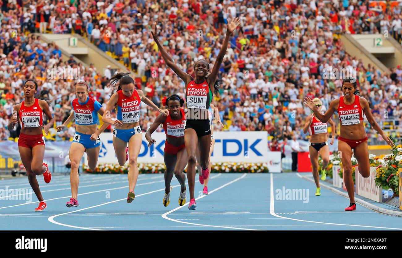 Kenya's Eunice Jepkoech Sum, center, crosses the finish line to win the ...